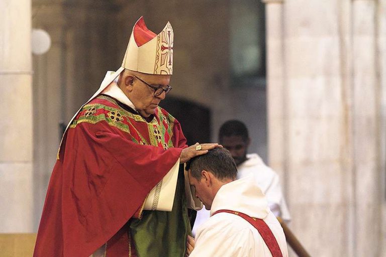 Ordained a priest, former Manchester United footballer's goal is Christ