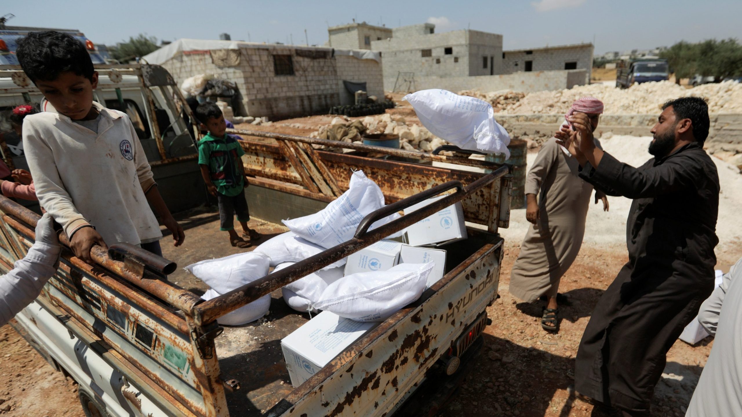 As U.N. vote nears, some want more cross-border access for aid to Syria