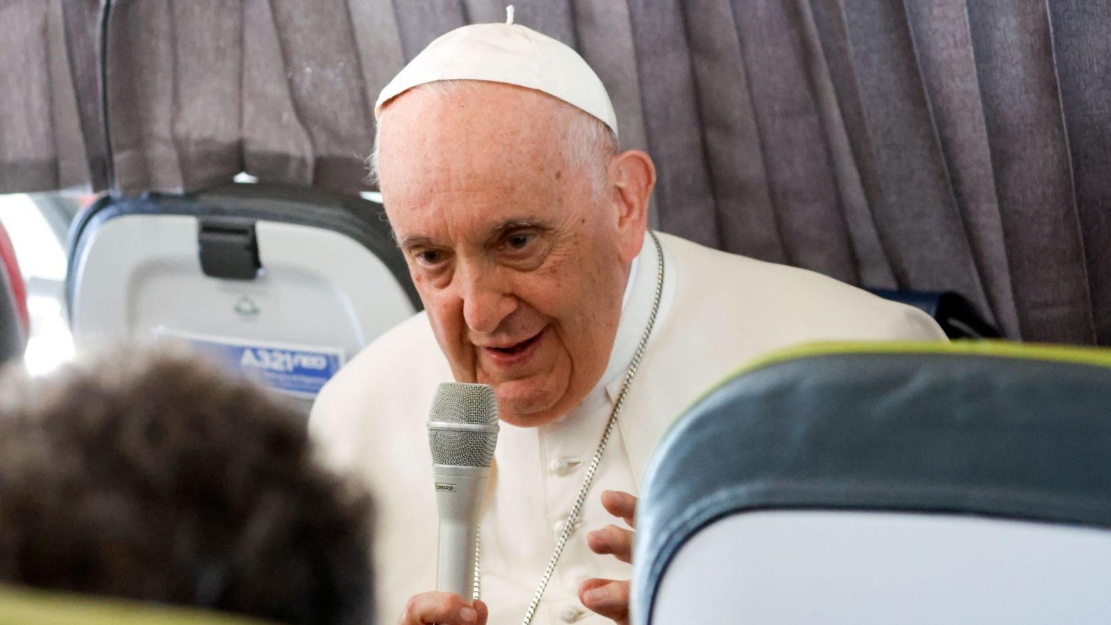 Pope on flight responds to questions about abuse, his health