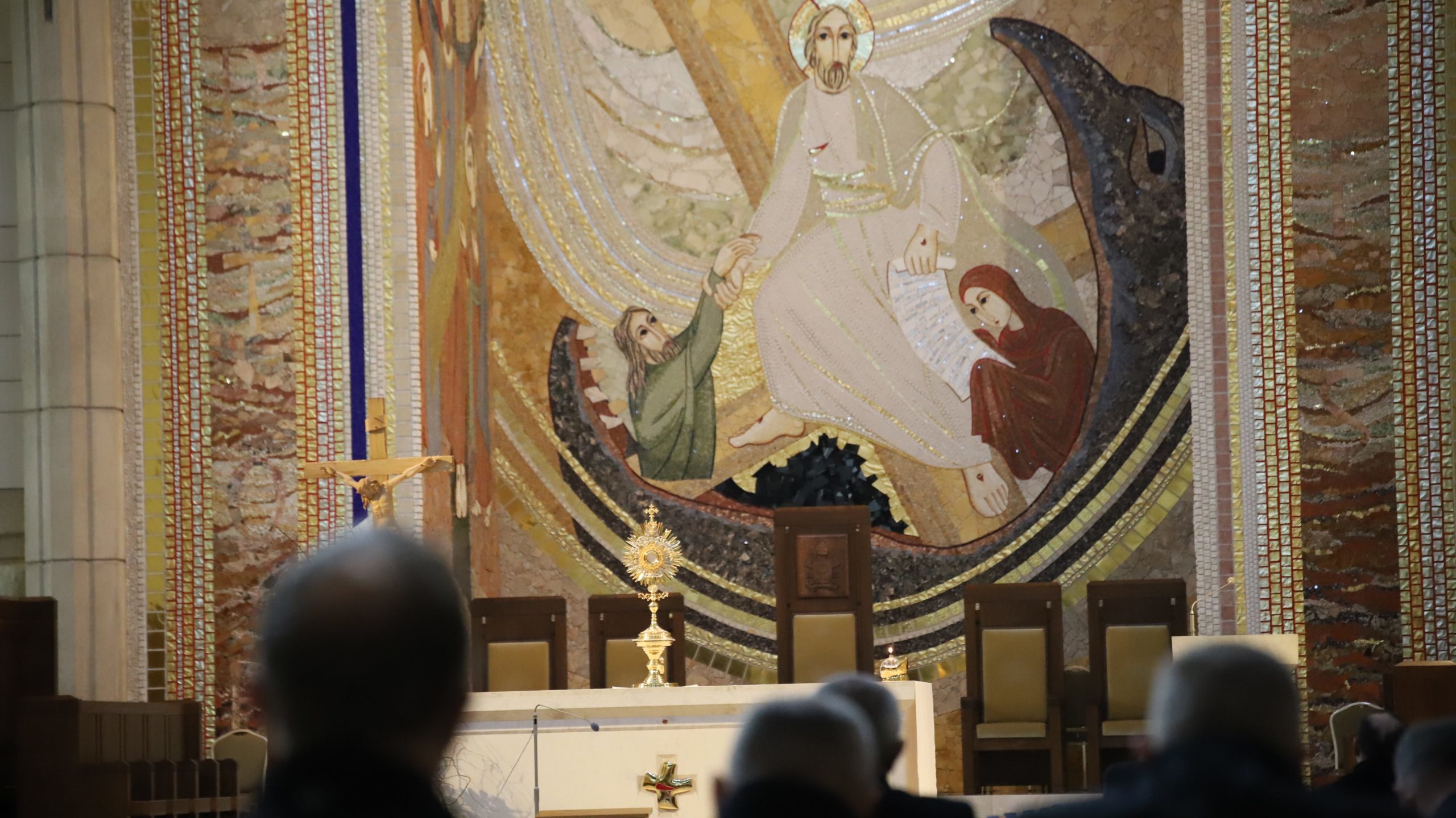 Why is a disgraced Jesuit’s art still hanging in churches around the world?