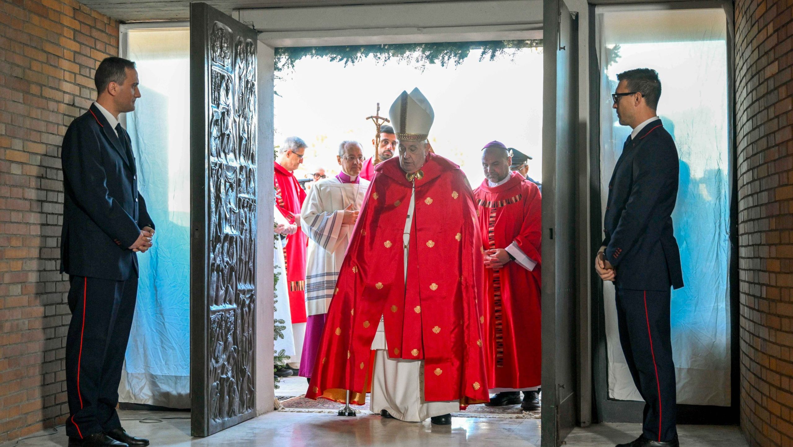 Don't lose hope, pope says as he opens Holy Door at Rome prison