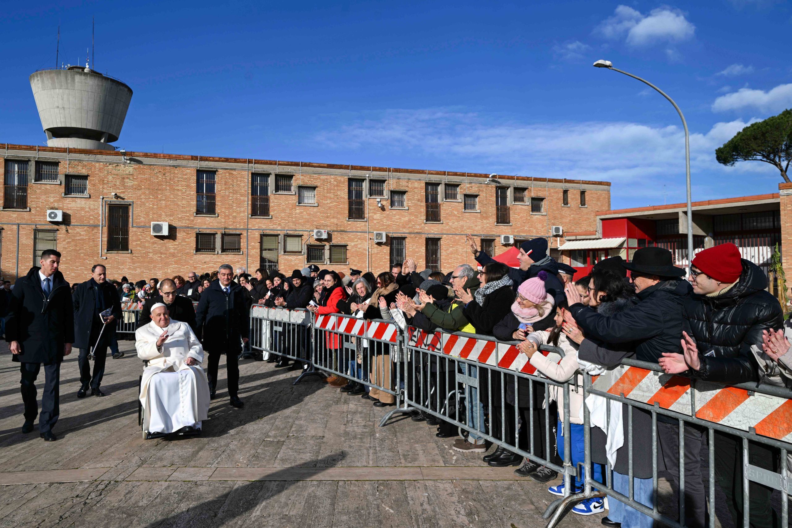 Don't lose hope, pope says as he opens Holy Door at Rome prison