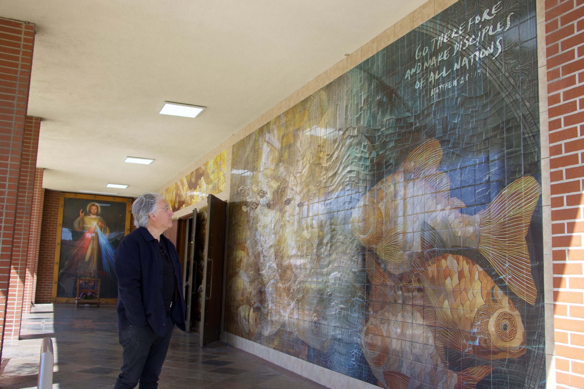 Artesia Catholic church’s new mural has ‘fishers of men’ motif